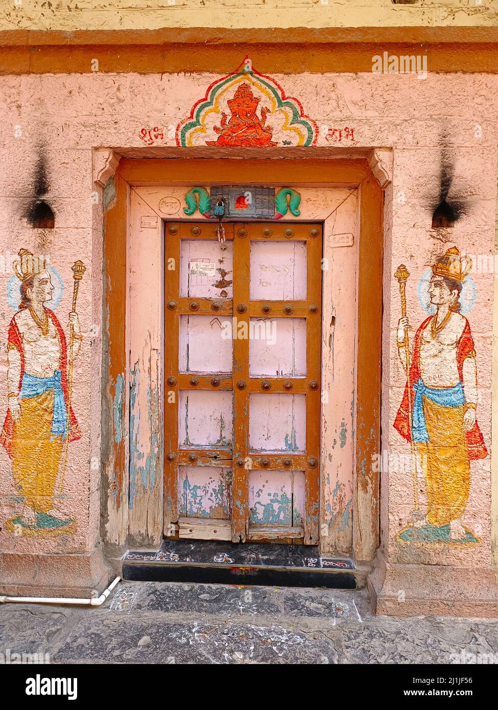 21 March 2022, Pandharpur, India, Old Vintage wooden door on retro wall ...