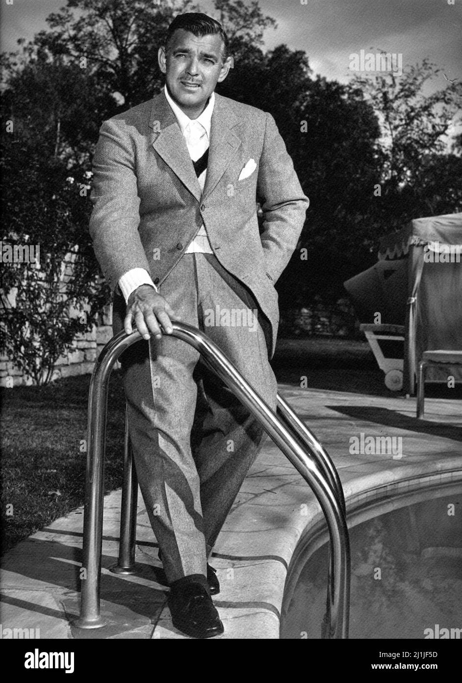 CLARK GABLE next to Swimming Pool at his Ranch Home in Encino ...