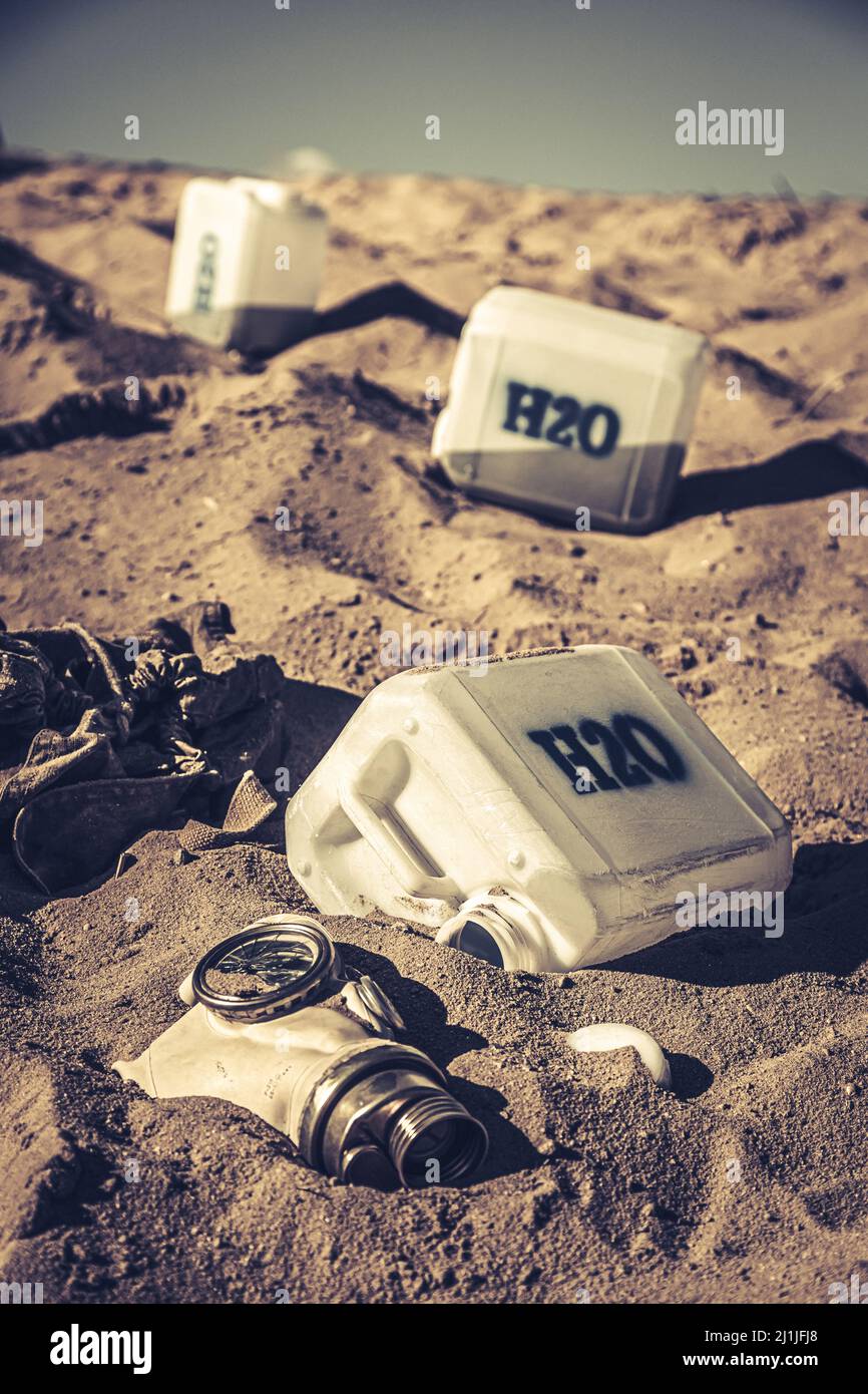 Contaminated water cans in danger and toxic desert. Empty plastic water ...