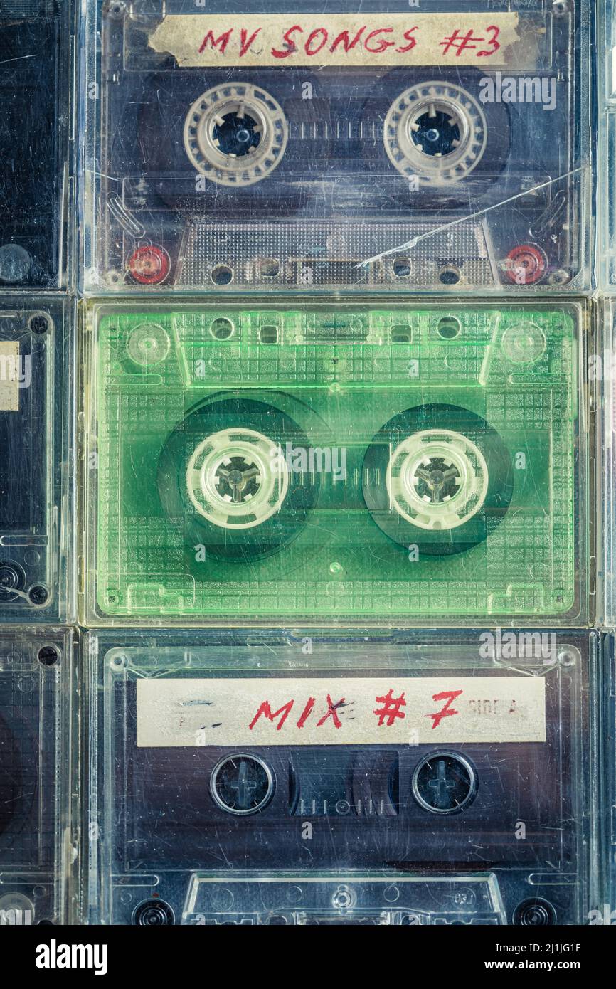 Transparent cassette tapes arranged in a grid on blue sofa Stock Photo ...