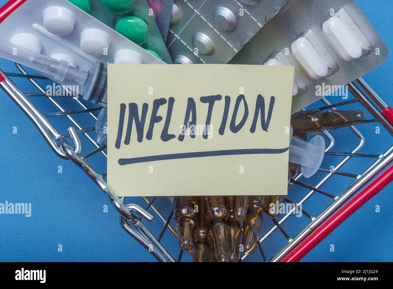 A basket with medical preparations in it on a blue background with ...