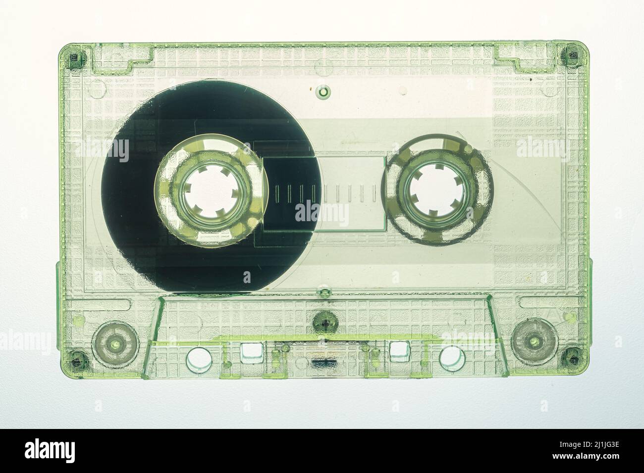 Closeup of one vintage green audio cassette on white background Stock ...