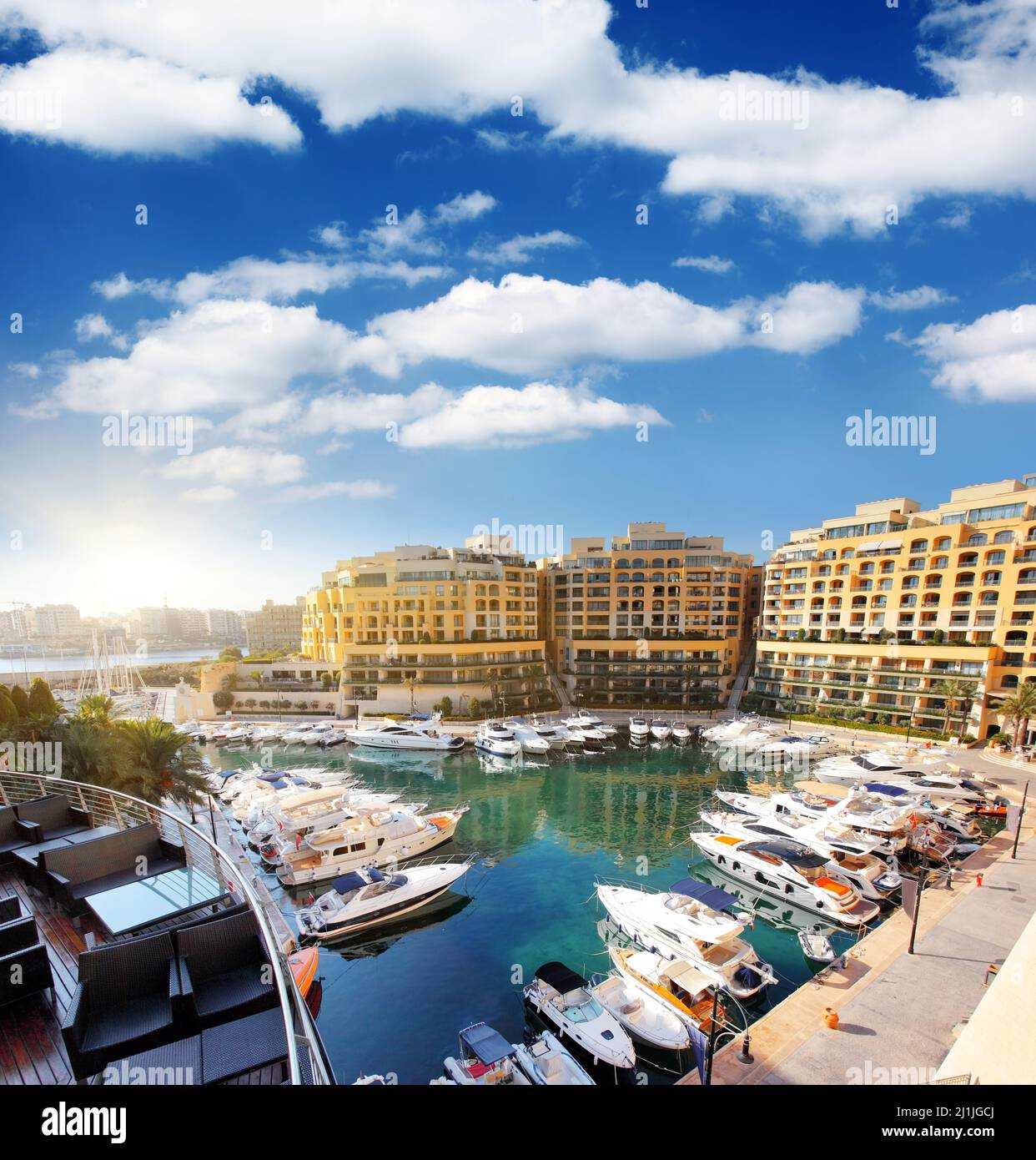 Fantastic city landscape on the seaside with boats. Portomaso Business ...