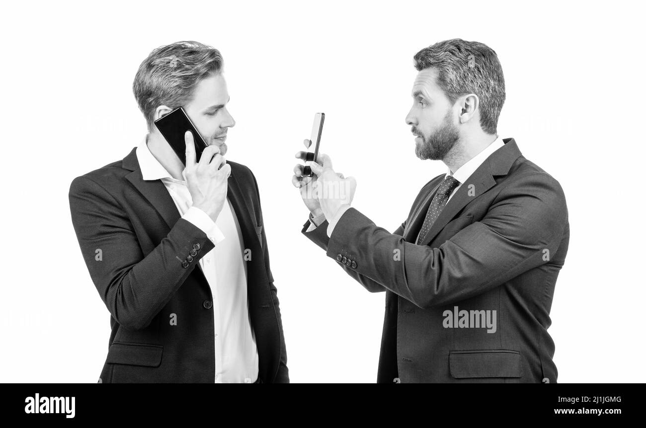 Constant connectivity. Businessmen use smartphones. Mobile ...