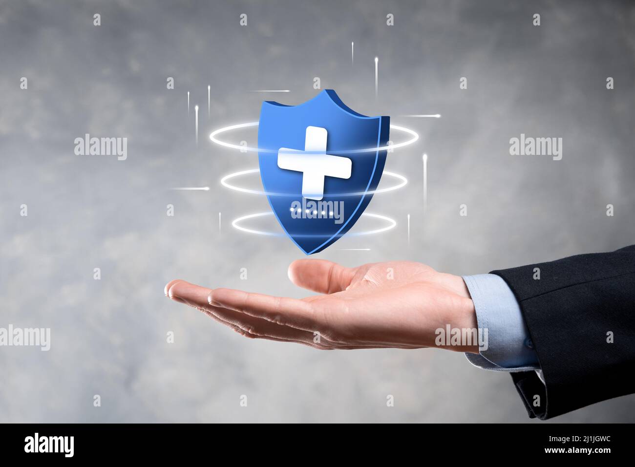 Businessman hold Shield with plus Low polygonal icon, medicine icon ...