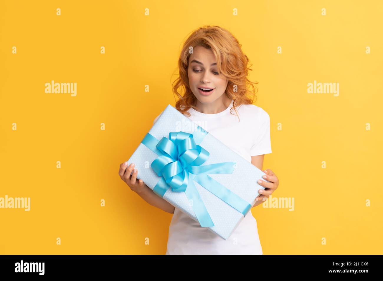 Woman wrapped gift box hi-res stock photography and images - Alamy