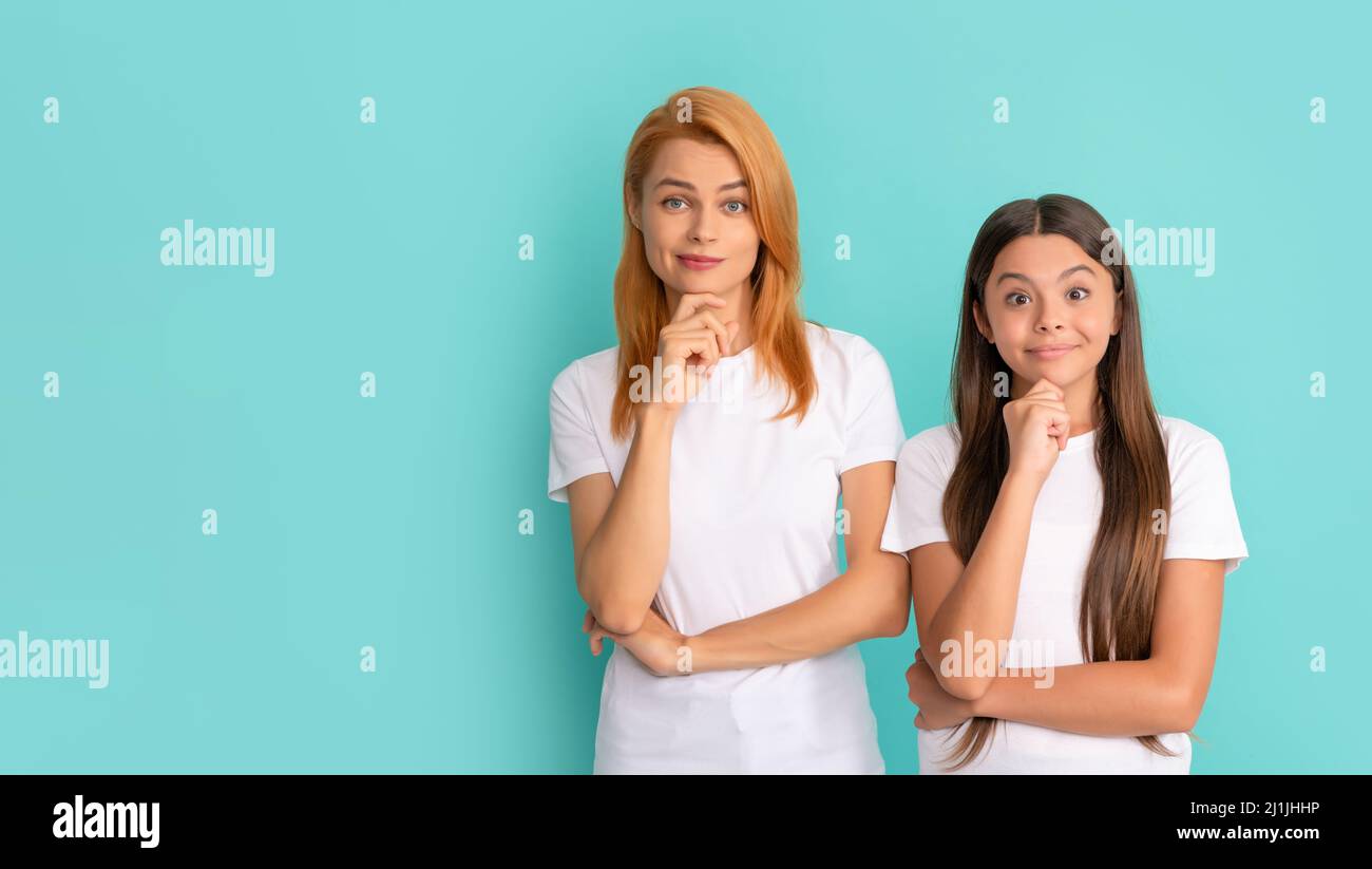 thinking mother and kid with straight hair in white shirts, decision ...