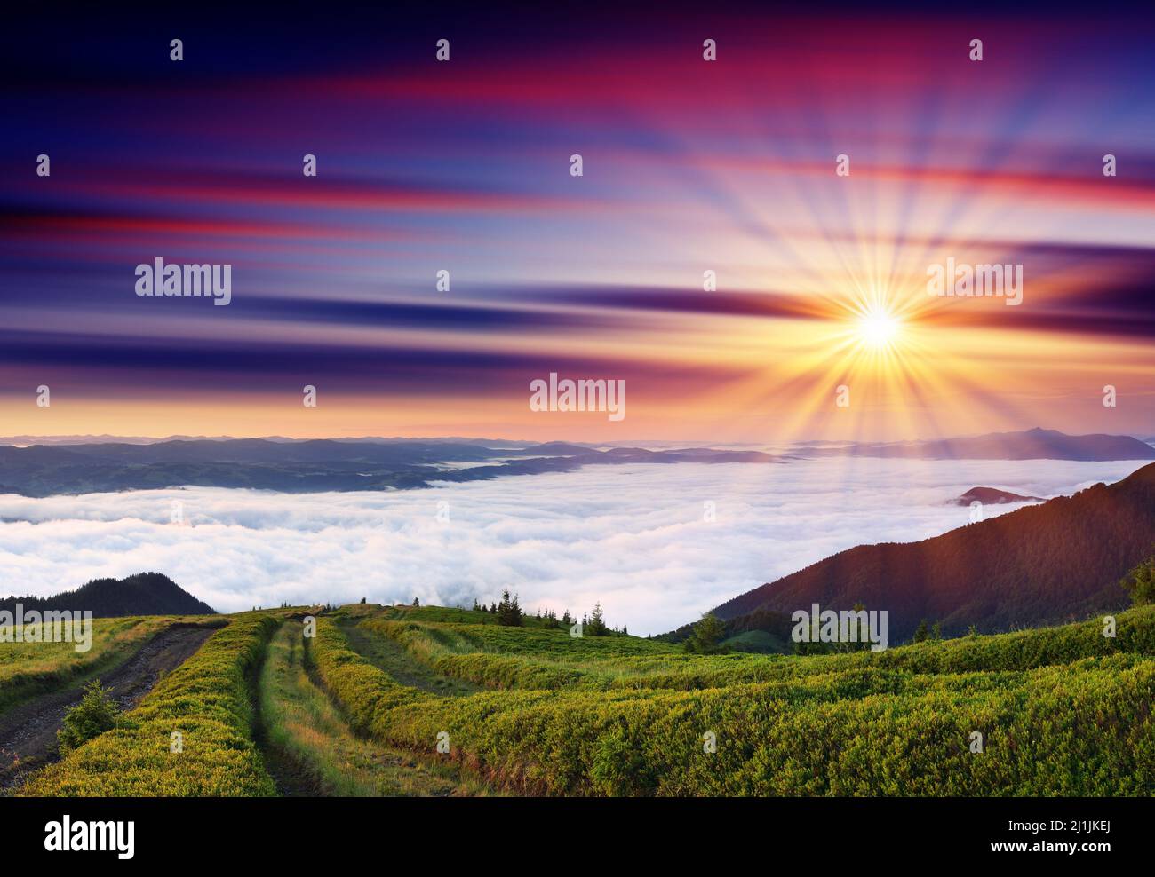 Landscape with mountains under morning sky with clouds Stock Photo - Alamy