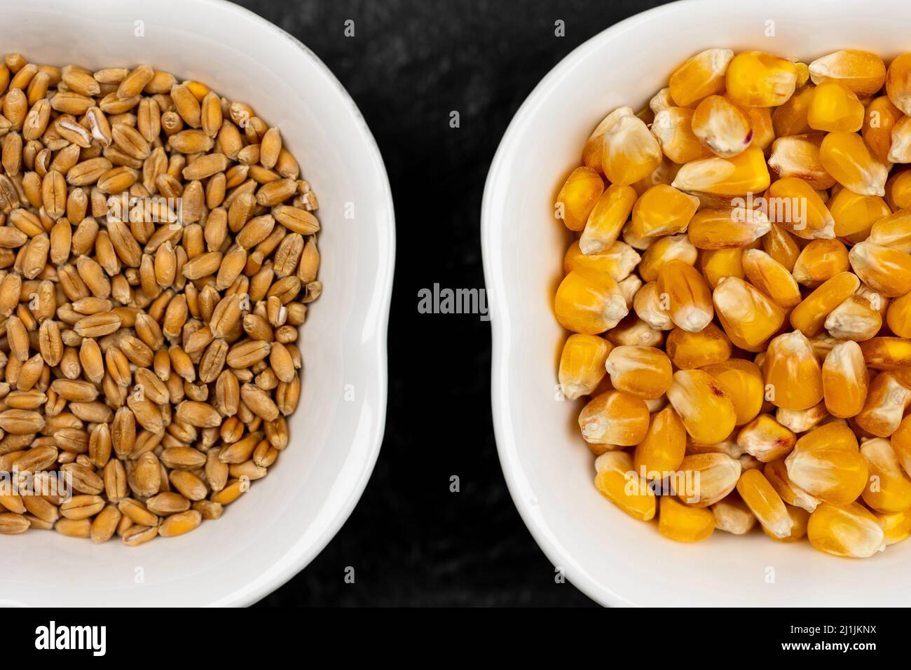 Raw grains of corn inside bowl hi-res stock photography and images - Alamy