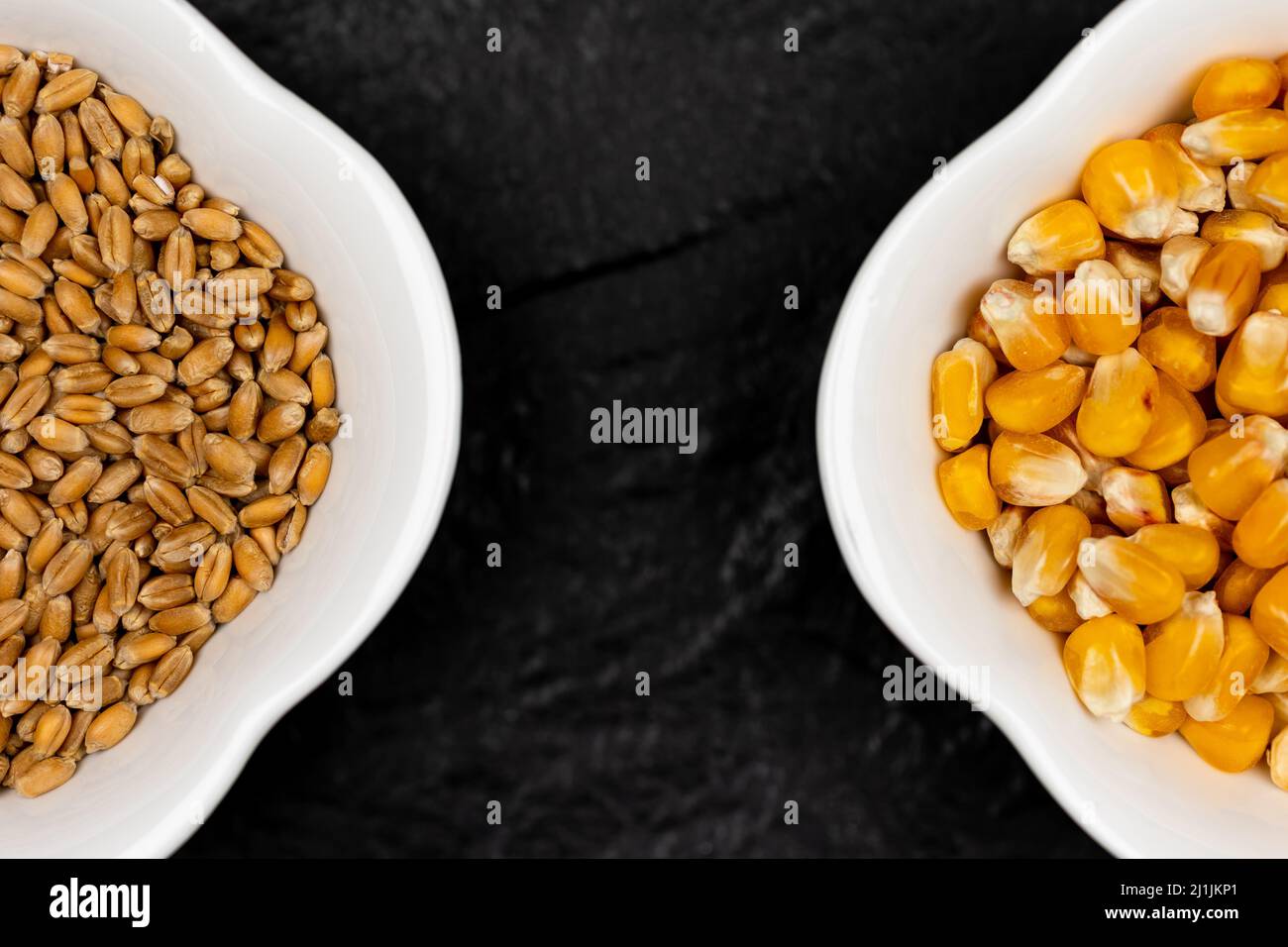 Raw grains of corn inside bowl hi-res stock photography and images - Alamy