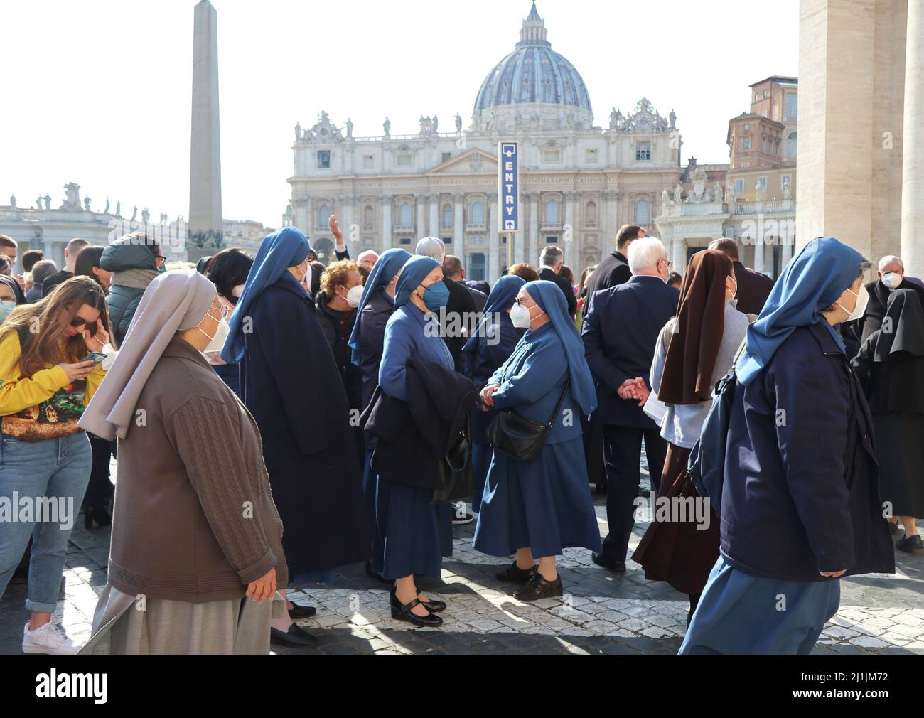 People attend the Pope’s Act of Consecration of Russia and Ukraine to ...