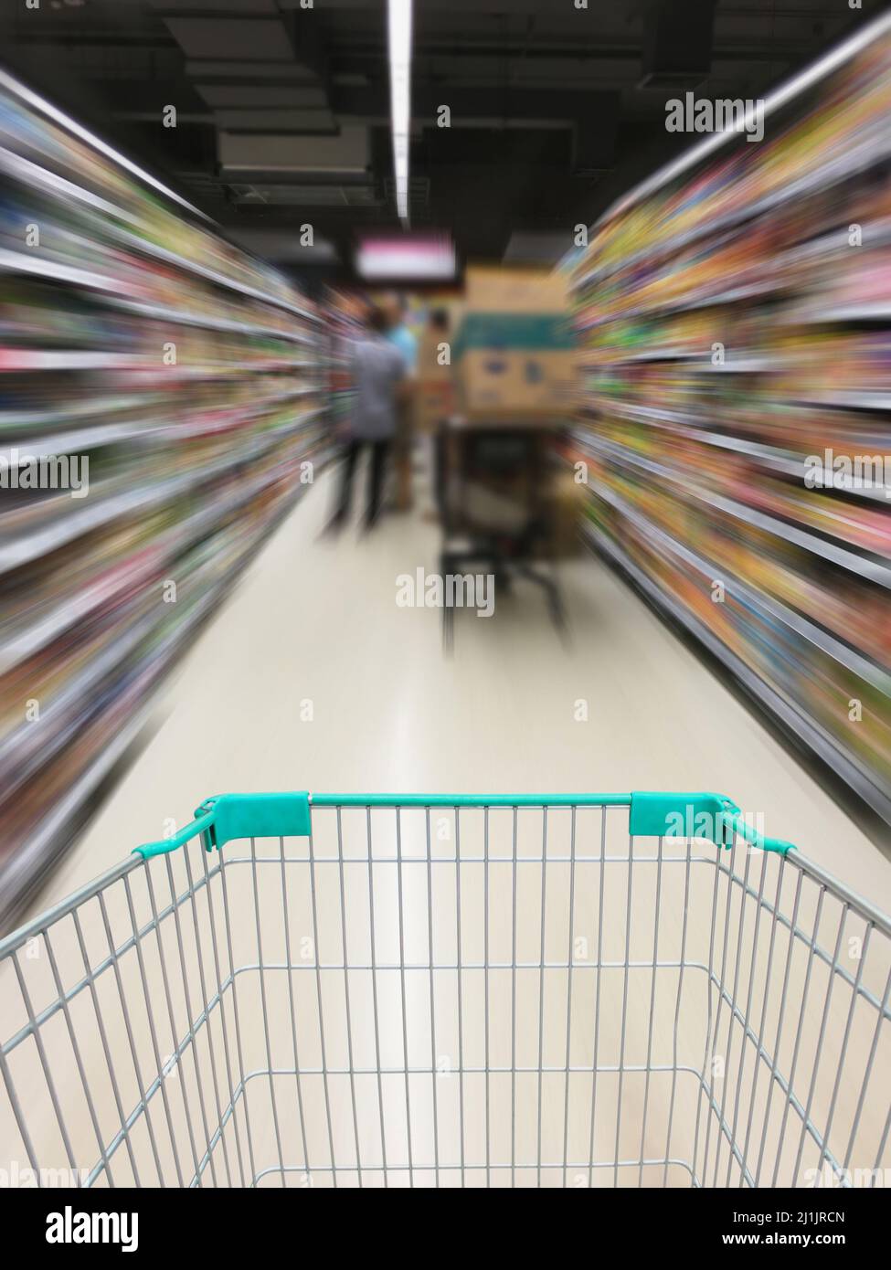 View of a shopping cart and aisle at supermarket Stock Photo - Alamy