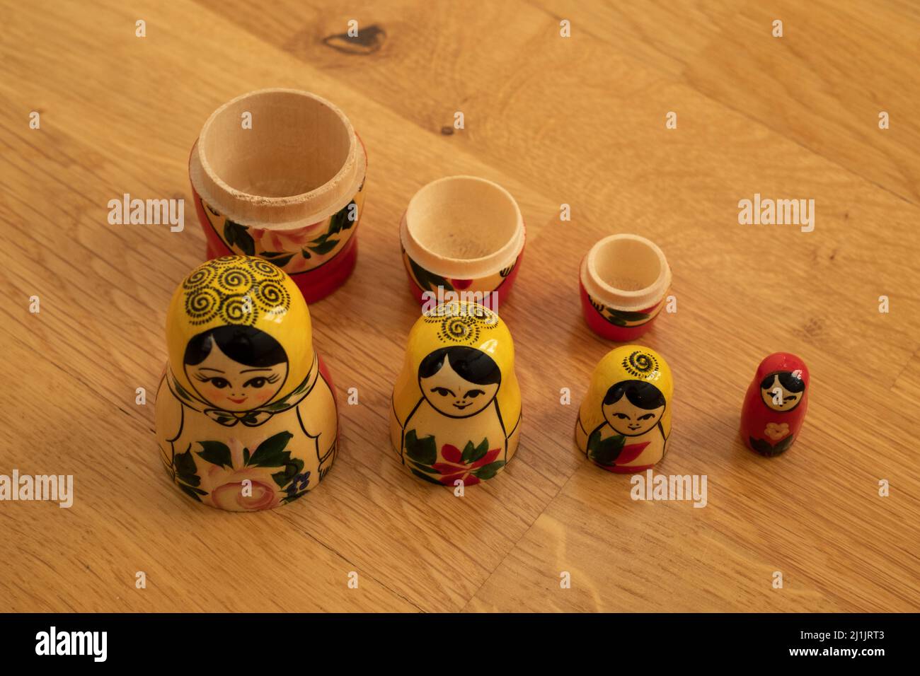 Set of traditional Russian wooden babushka dolls - matrioshka. Stacking ...