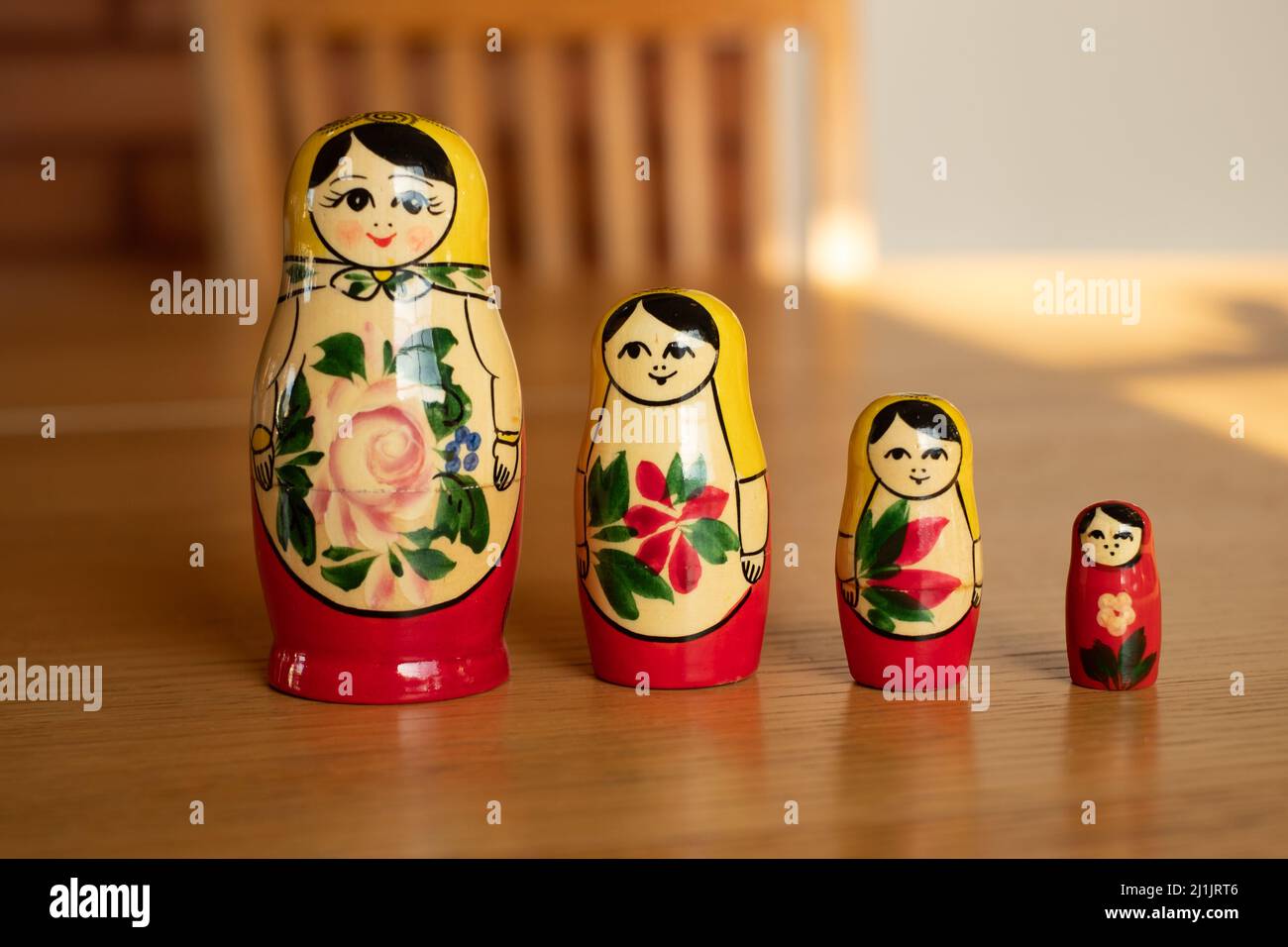 Set of traditional Russian wooden babushka dolls - matrioshka. Stacking ...