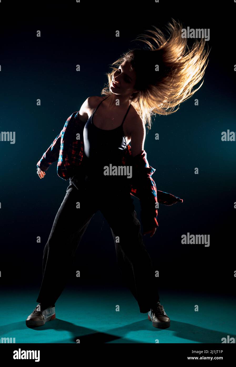 Beautiful girl performing a contemporary dance routine Stock Photo - Alamy