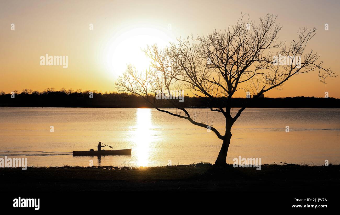 Canoeing at sunset hi-res stock photography and images - Alamy