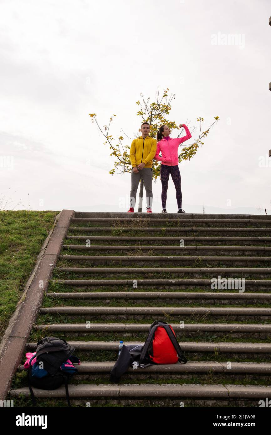 Amazing and attractive strong couple is flexing together Stock Photo ...