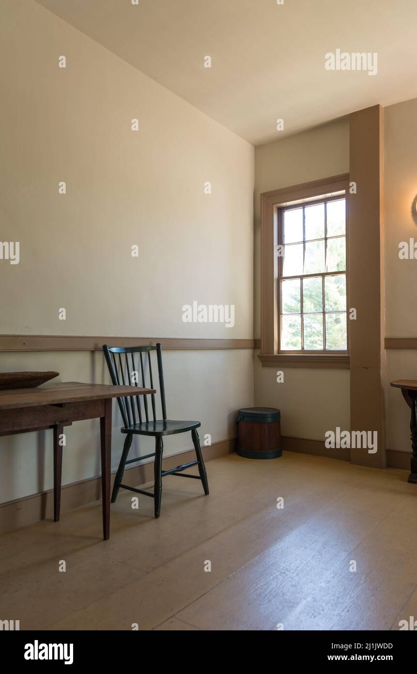 A colonial kitchen with table and chair Stock Photo - Alamy