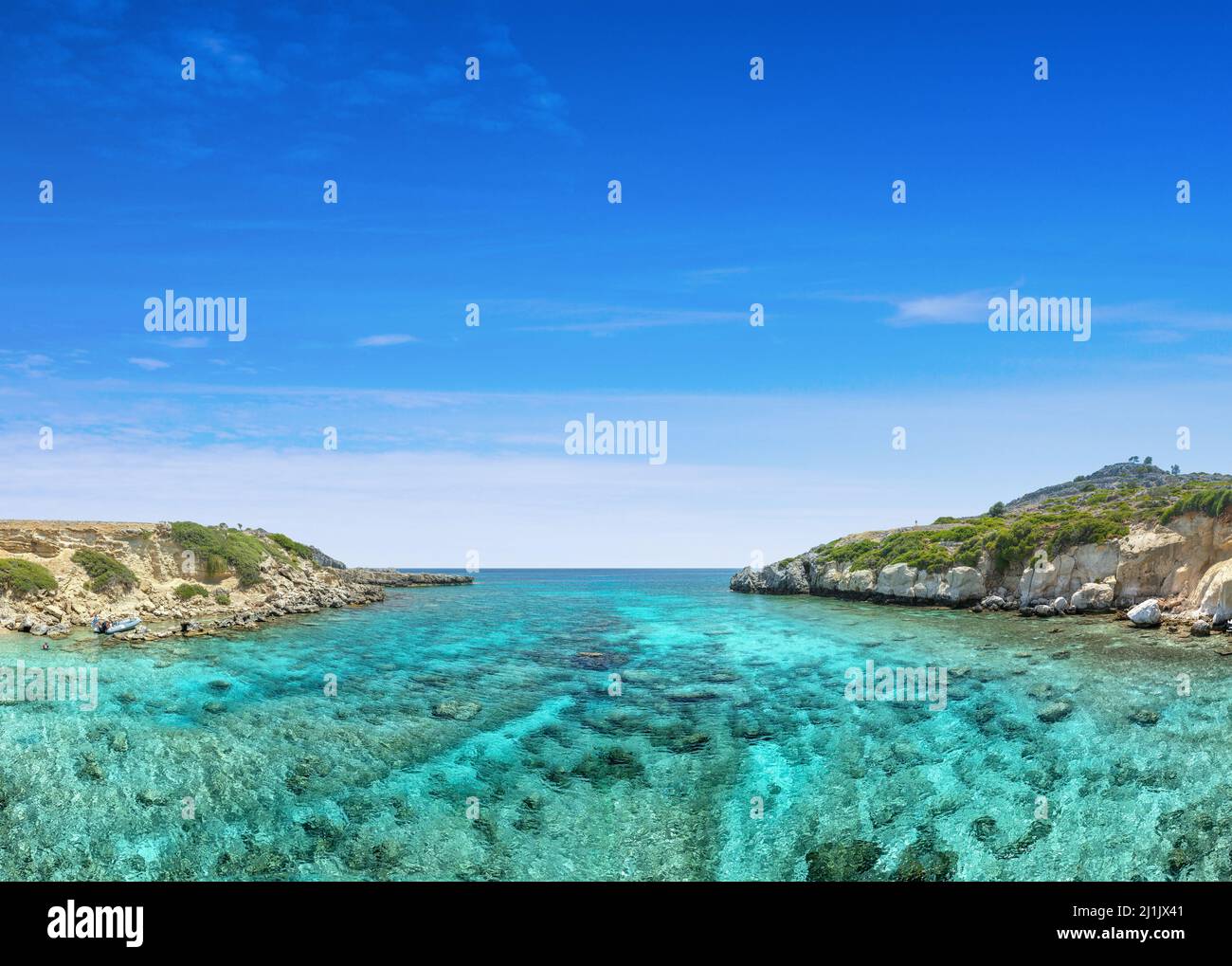 Crystal clear turquoise water in a Fokia closed bay. One of the famous ...