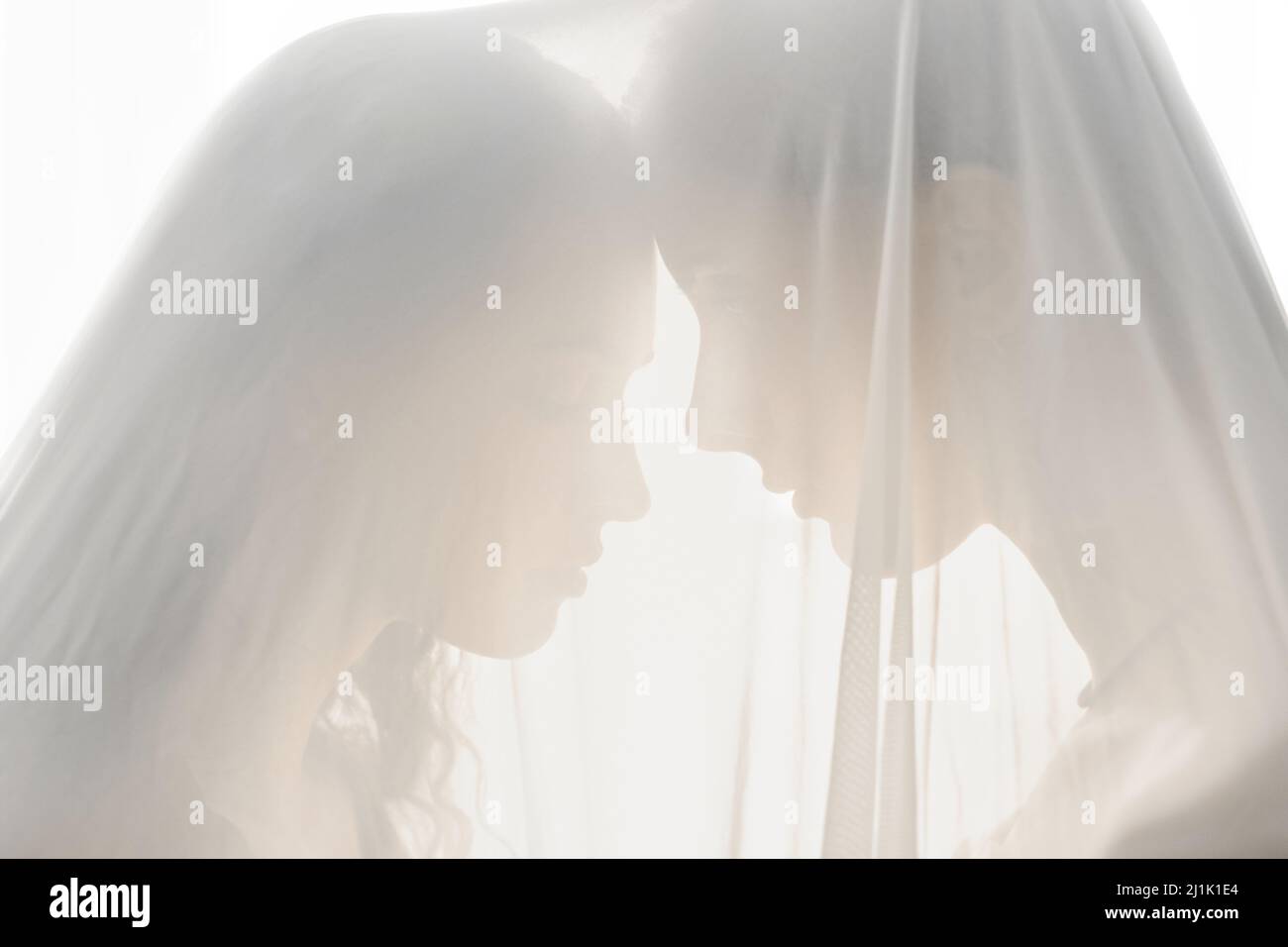 Two men foreheads touching hi-res stock photography and images - Alamy