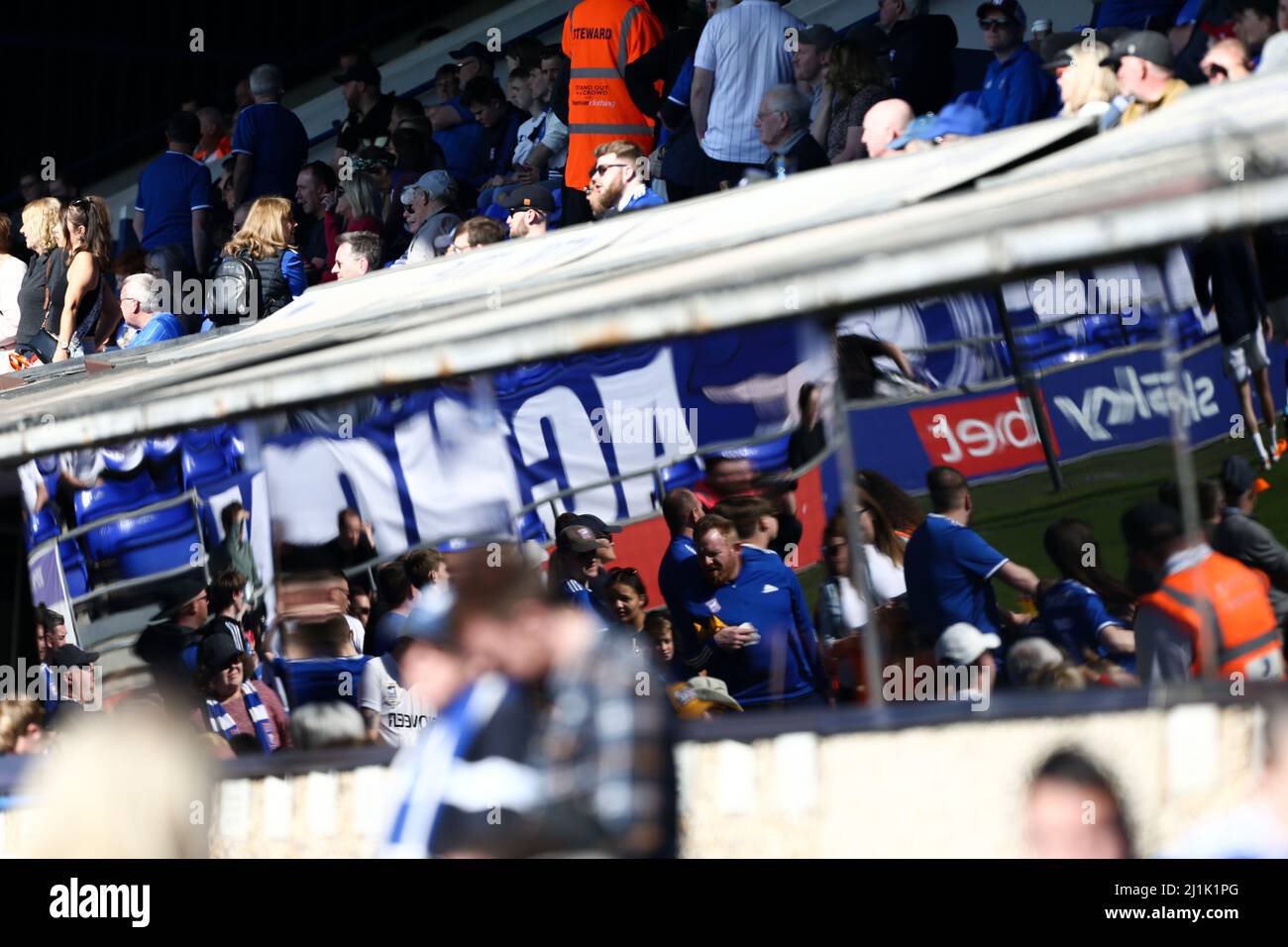 Ipswich Town fans seen in the reflections Stock Photo - Alamy