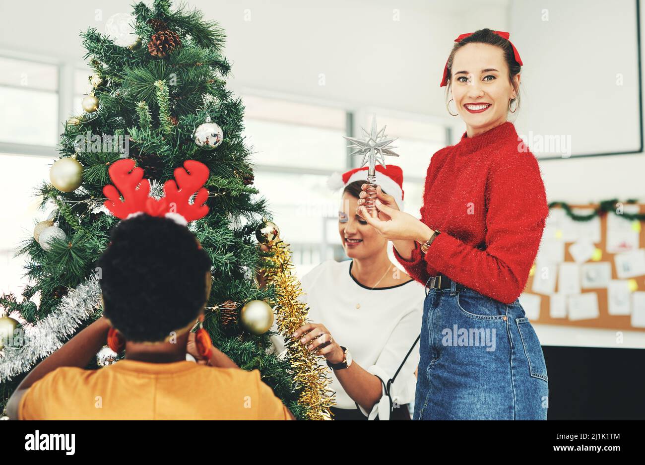 A Christmas tree isnt complete without the shining star. Portrait of an ...