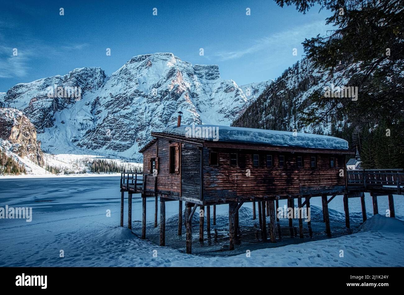 The wooden shack on stilts used in summer for boat rental on Lake ...
