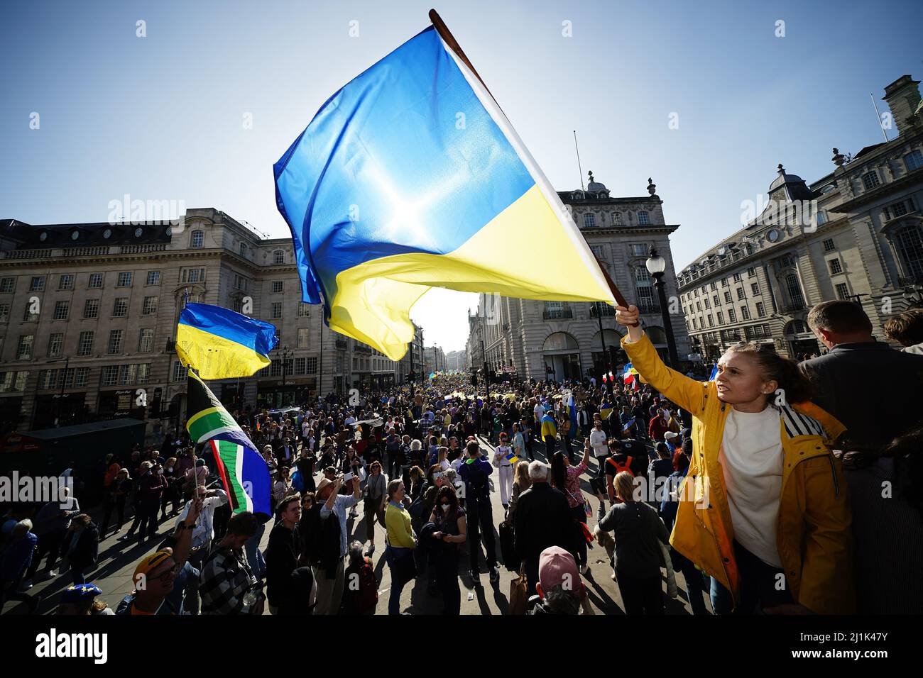 People during a solidarity march in London for Ukraine, following the ...