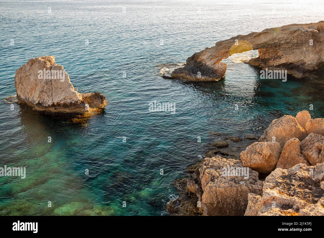 Summer resort rocky coastline seafront view with famous Love Bridge ...