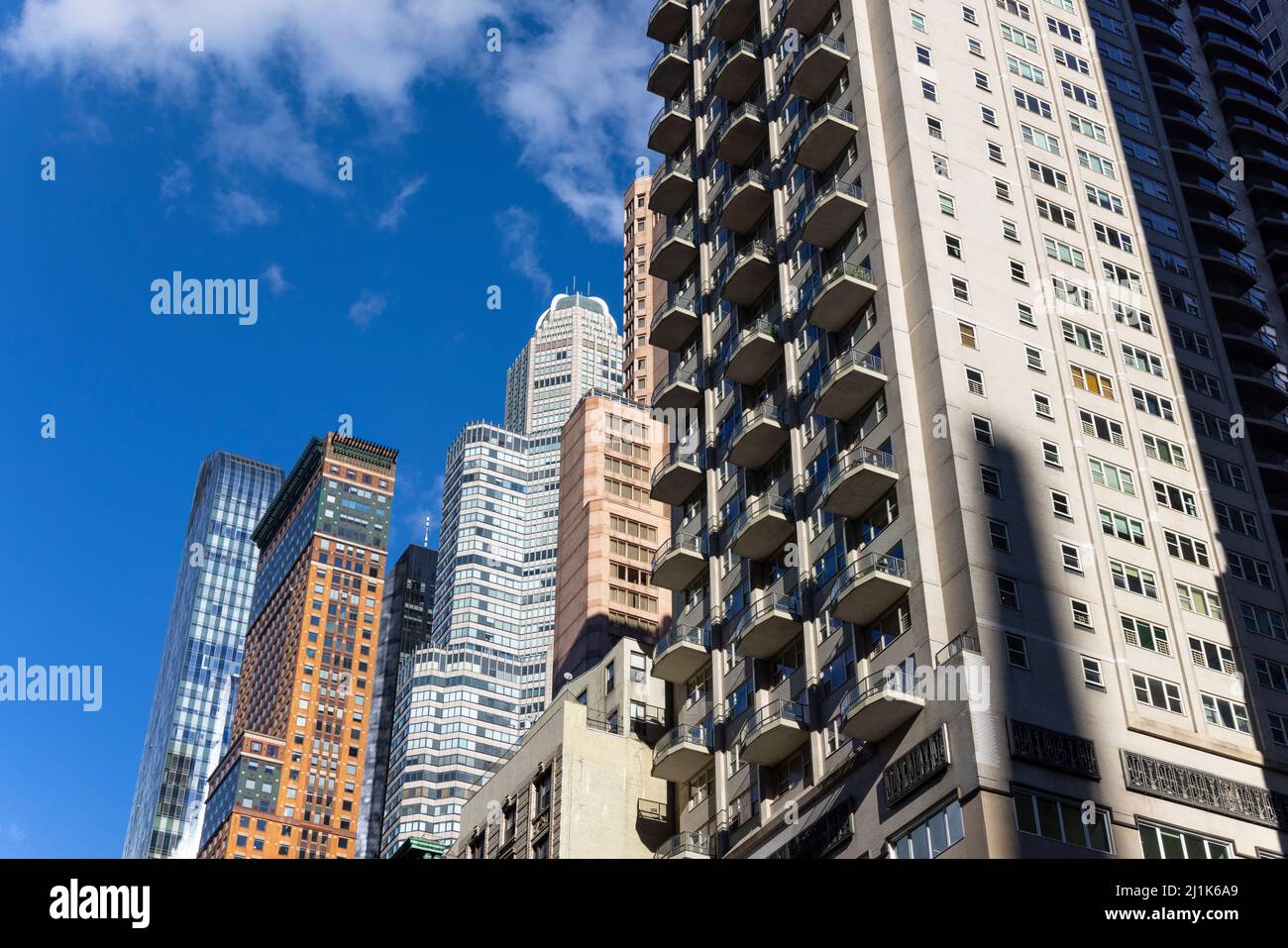 Ultra luxury high-rise residential buildings stand among Midtown ...