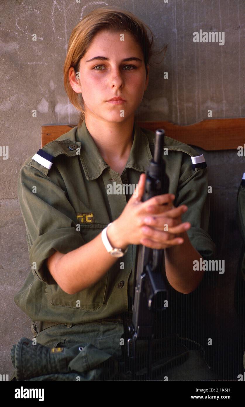 Woman Holding Uzi