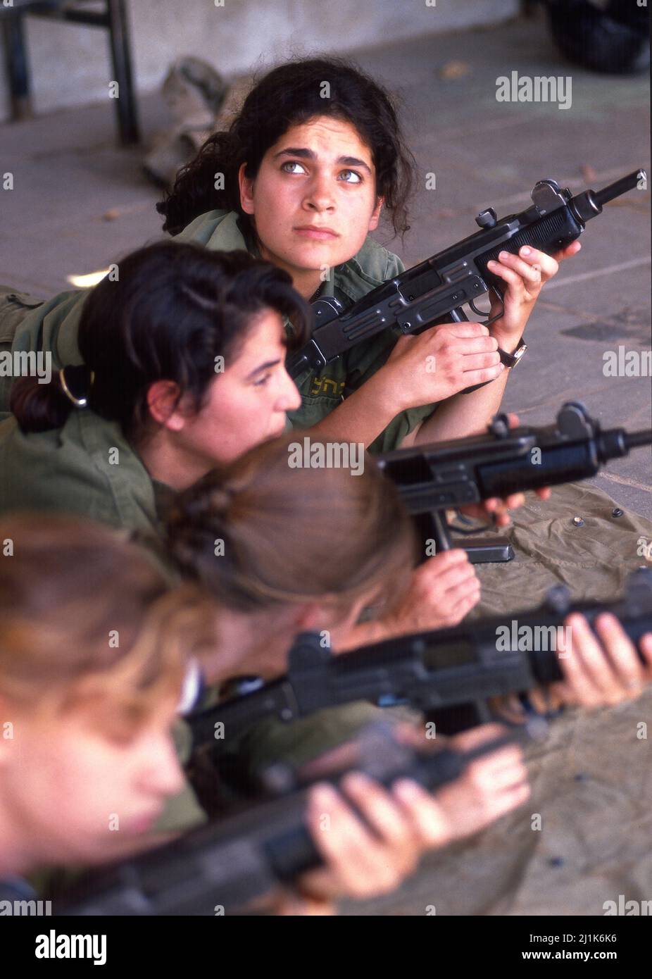 Woman Holding Uzi