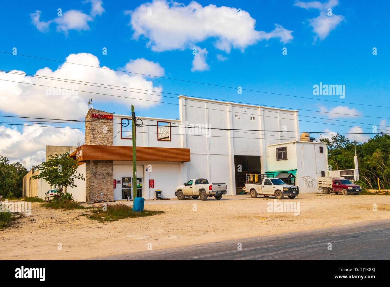 Tulum Mexico 02. February 2022 Driving thru typical colorful street ...
