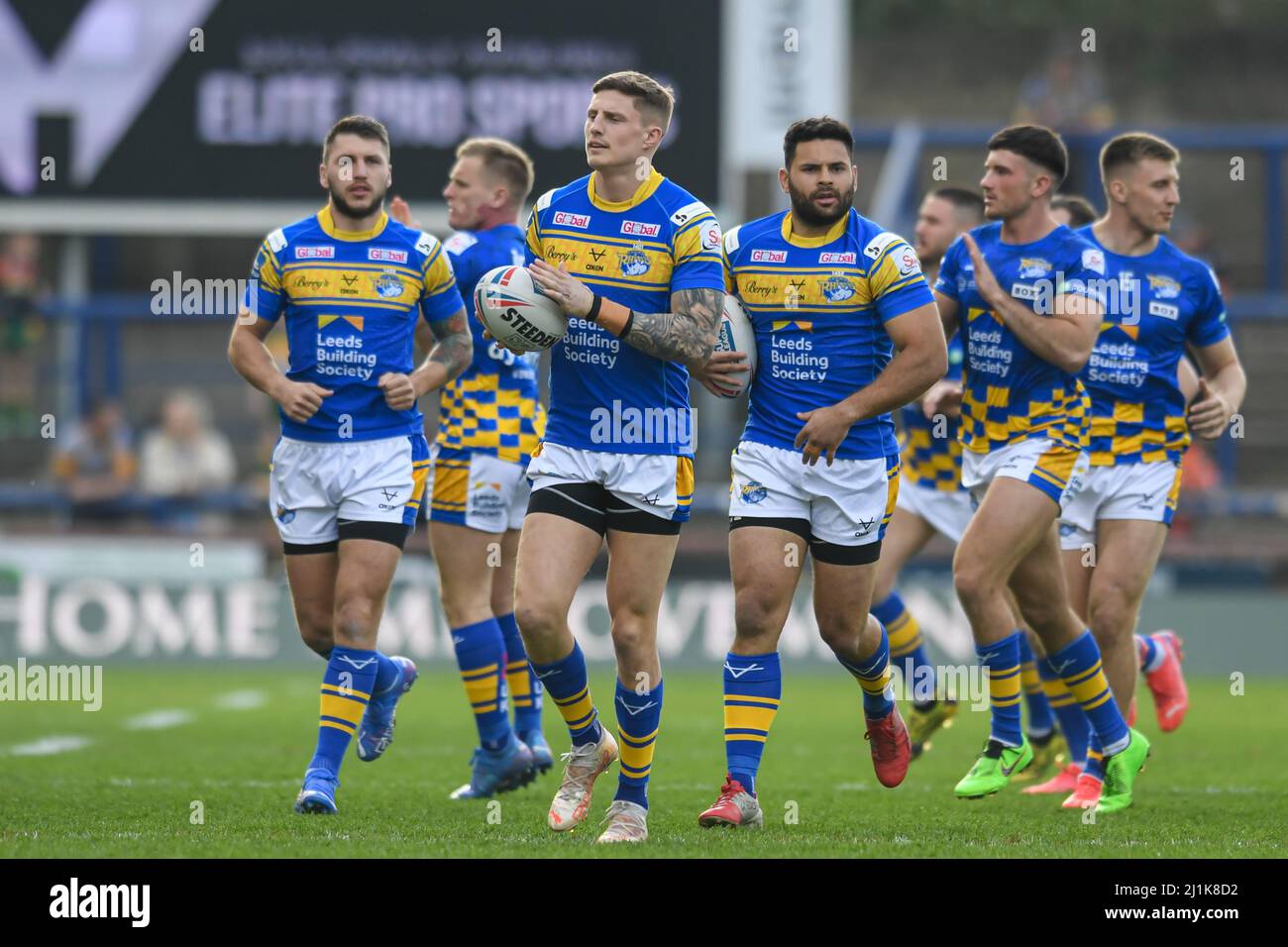 The Leeds Rhinos players begin their warm up Stock Photo - Alamy
