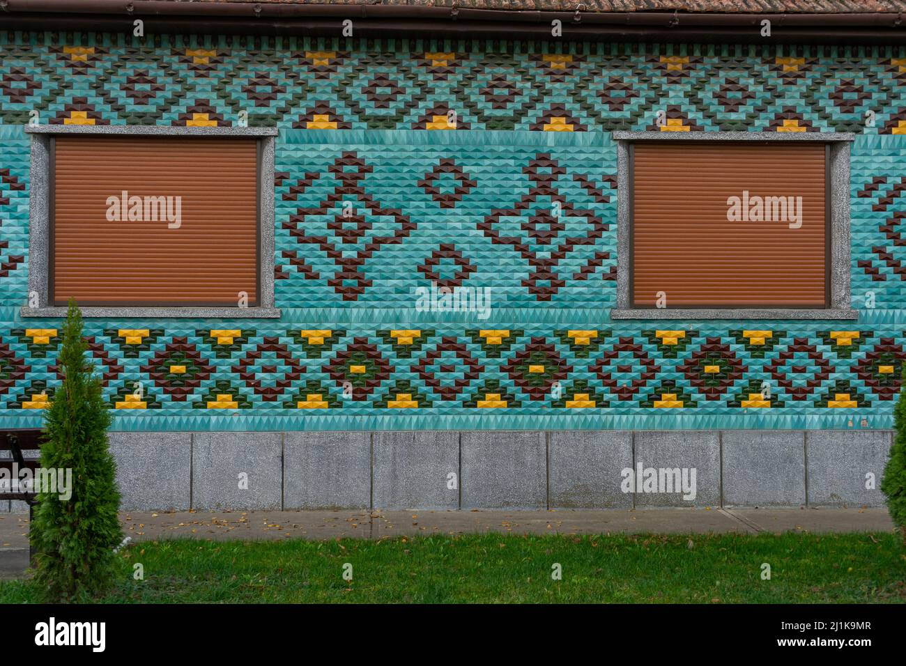 Facade of a traditional house filled with mosaic patterns Stock Photo ...