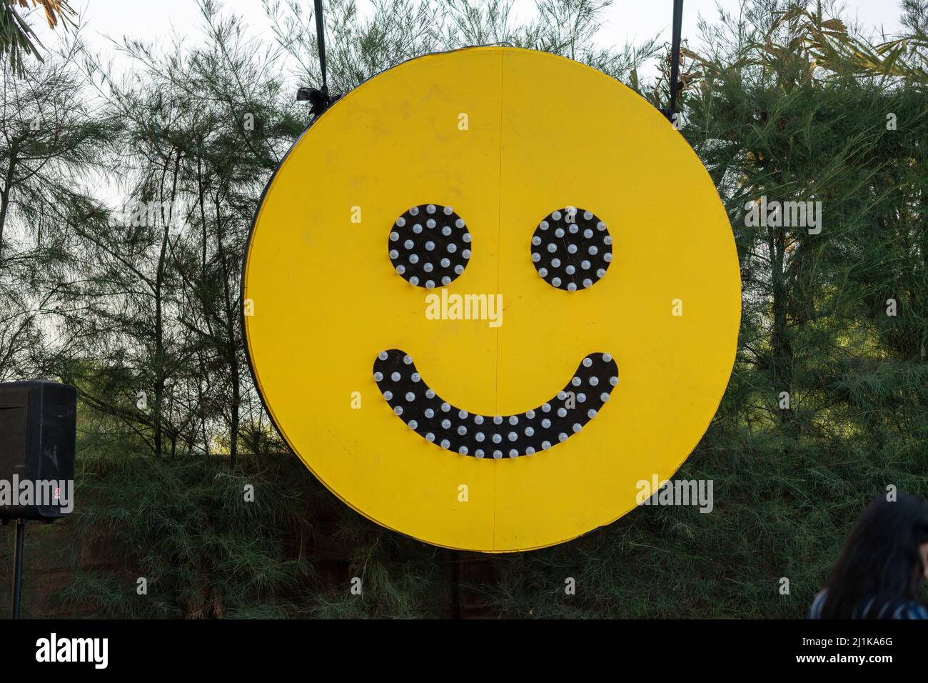 A smiley banner in the park with a face made out of pearls Stock Photo ...