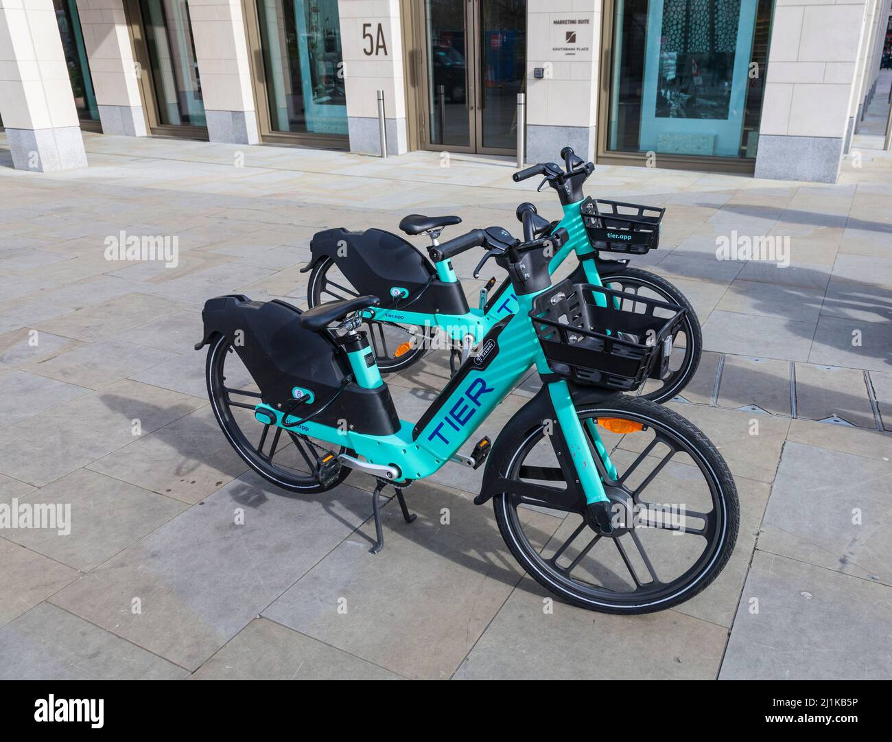 Tier E-Bikes in a parking bay in London,England,UK Stock Photo - Alamy