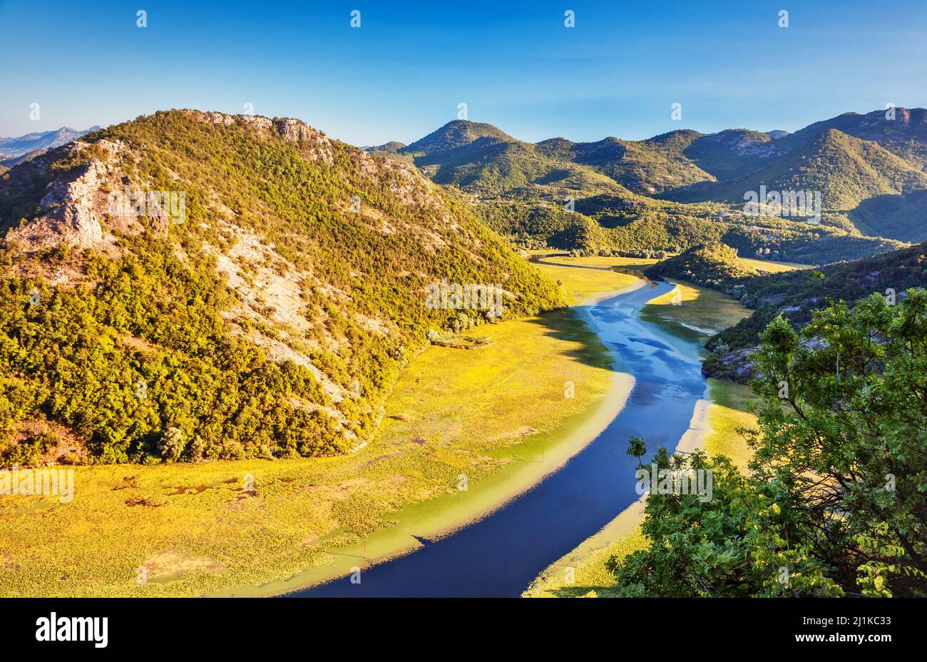 Sinuous river flowing through mountains. Natural park. Dramatic scene ...
