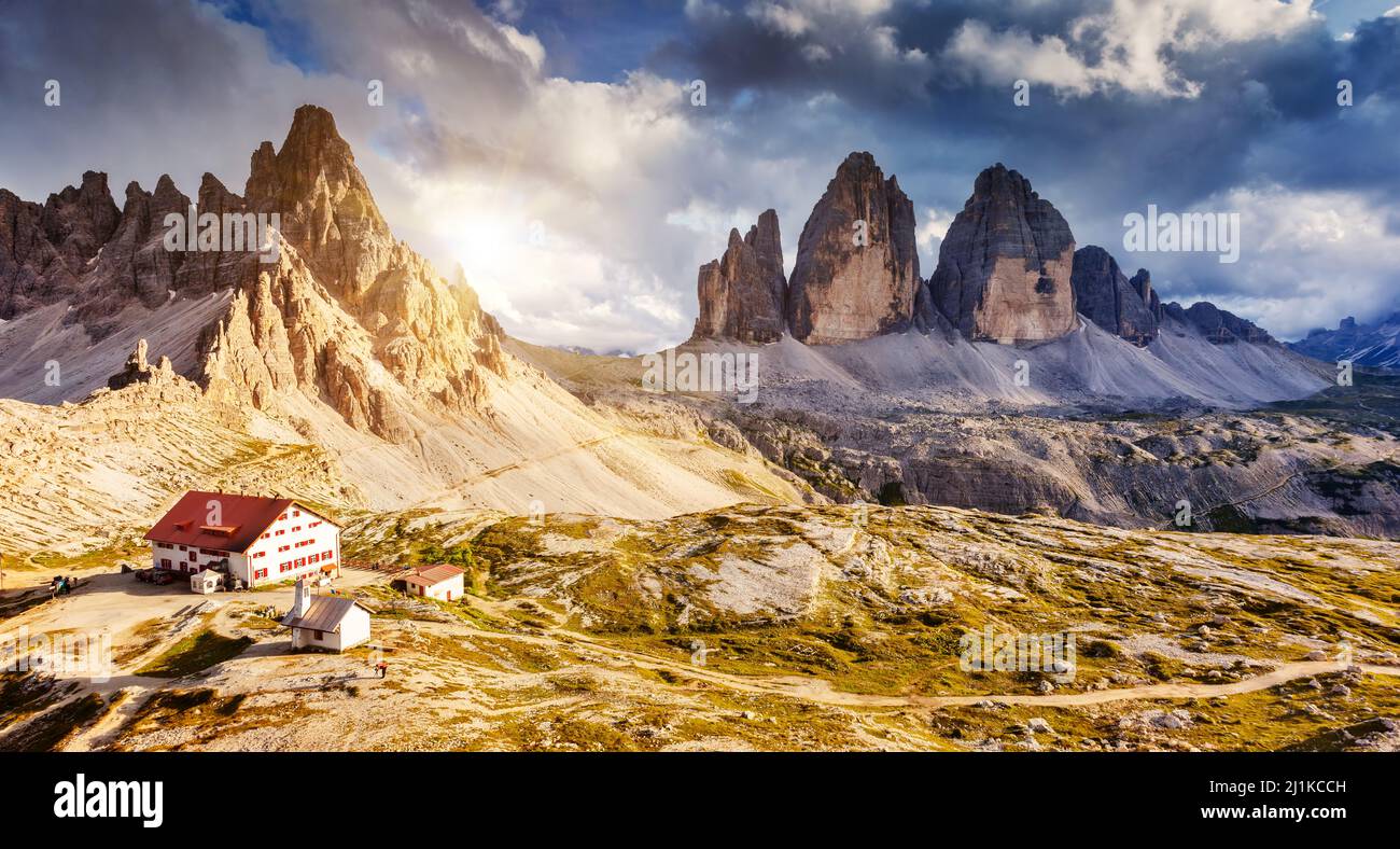 Great sunny view of the National Park Tre Cime di Lavaredo with rifugio ...