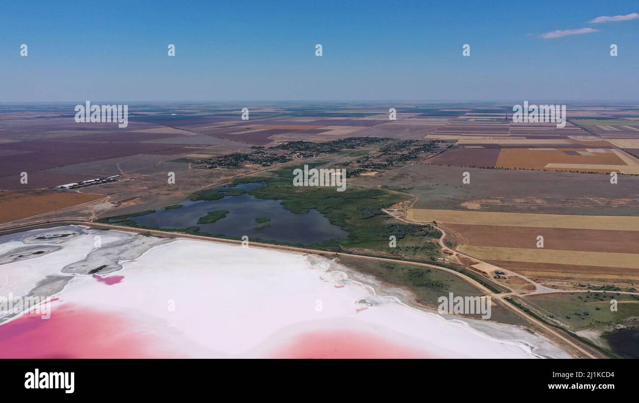 Aerial view of White salt on the shores of the island in Pink Island ...
