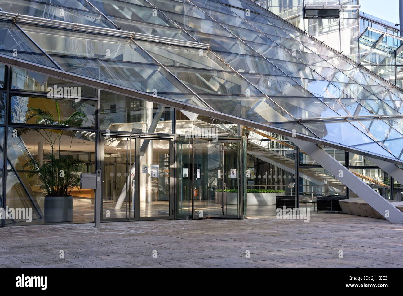 Inner courtyard and modern glass facade of an office building in ...