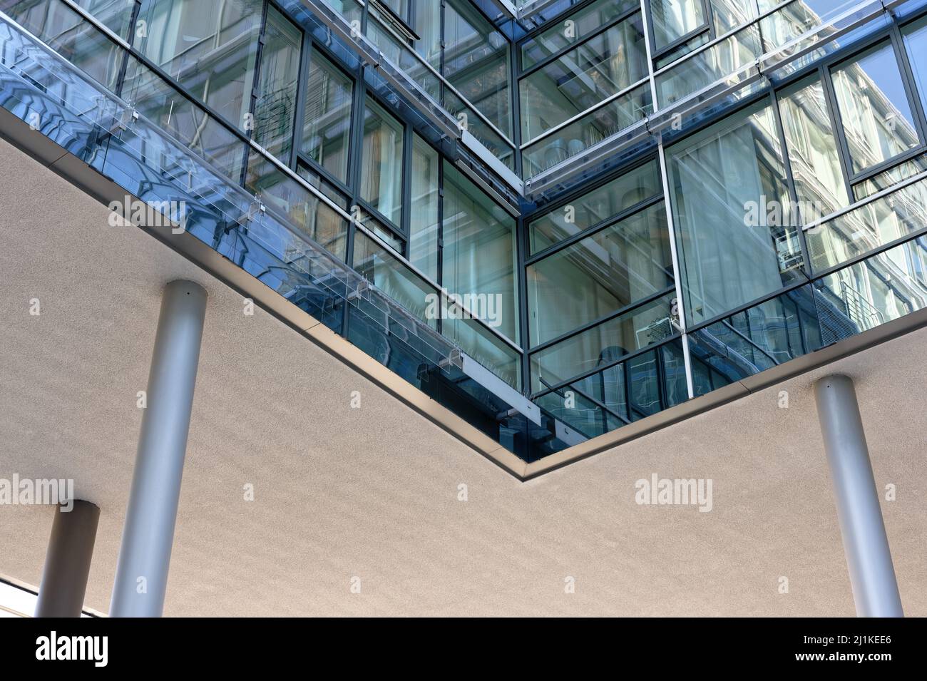 Inner courtyard and modern glass facade of an office building in ...
