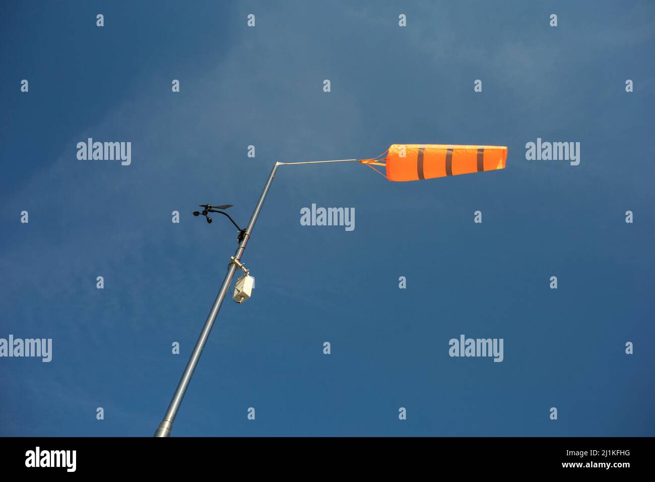 Orange conical windsock and wind cone - meteorologic device and tool on ...