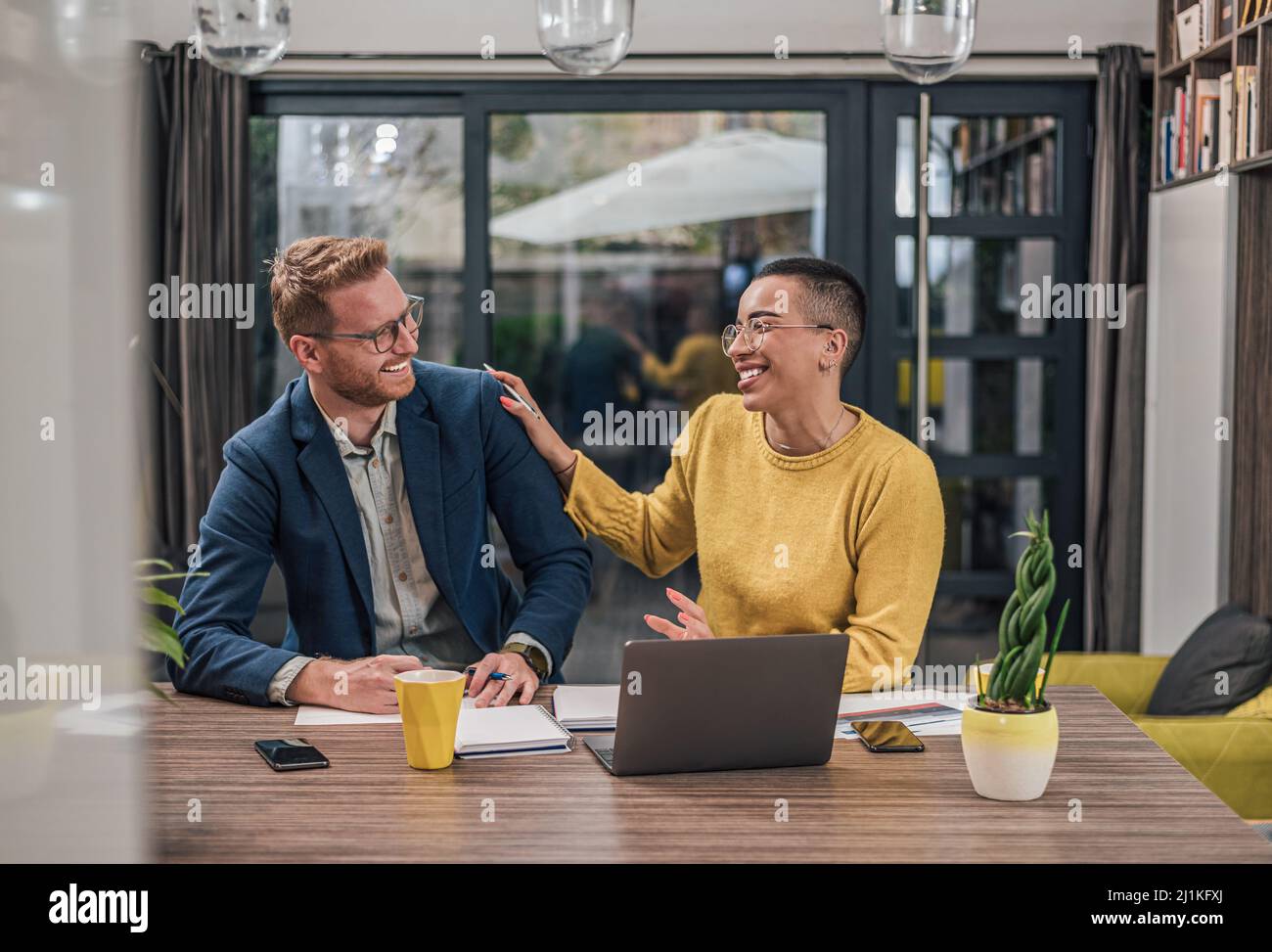 Cheerful company coworkers, supporting each other in their work Stock ...