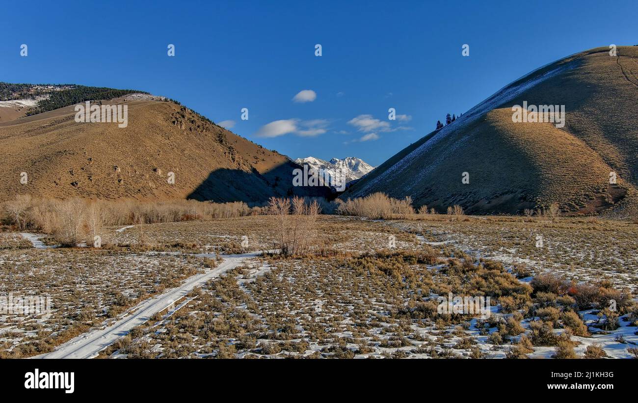 Dirt road leads to distant mount peak in Lemhi Range Idaho Stock Photo ...