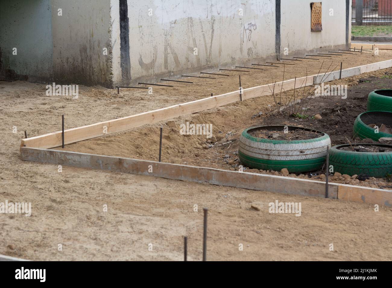 Foundation blind area preparing. Basic formwork marking. Blind area ...