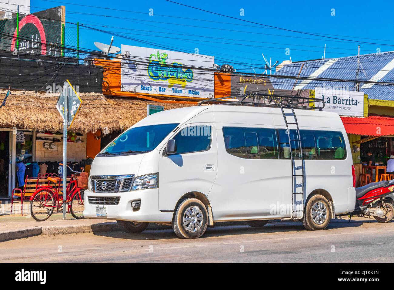 Tulum Mexico 02. February 2022 Driving thru typical colorful street ...