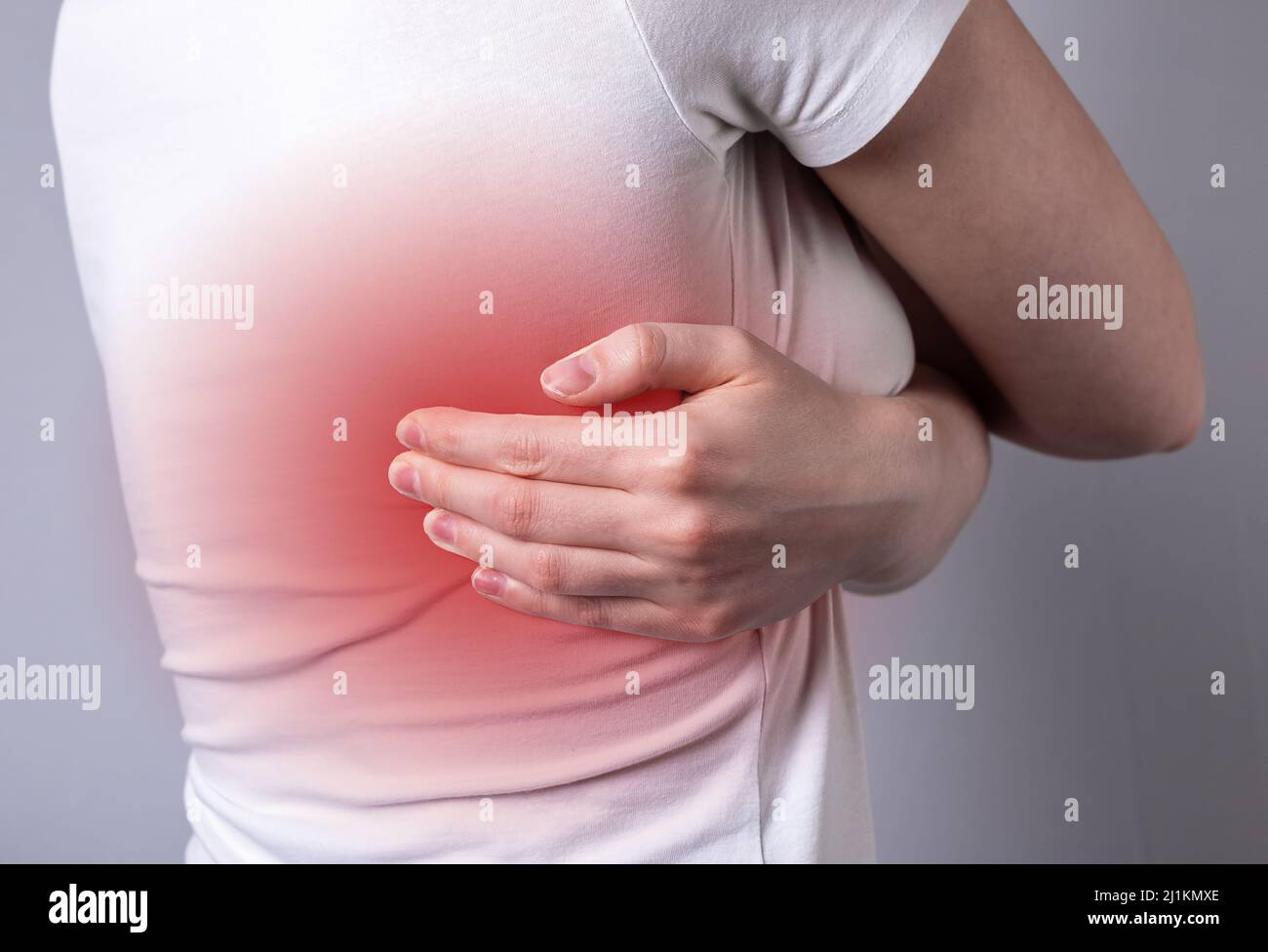 Intercostal neuralgia. Woman suffering from backache with red spot ...