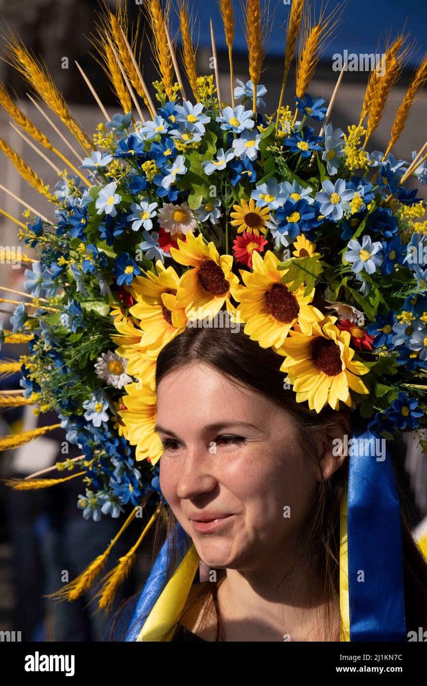 A Ukrainian woman stands in Trafalgar Square during the protest in ...