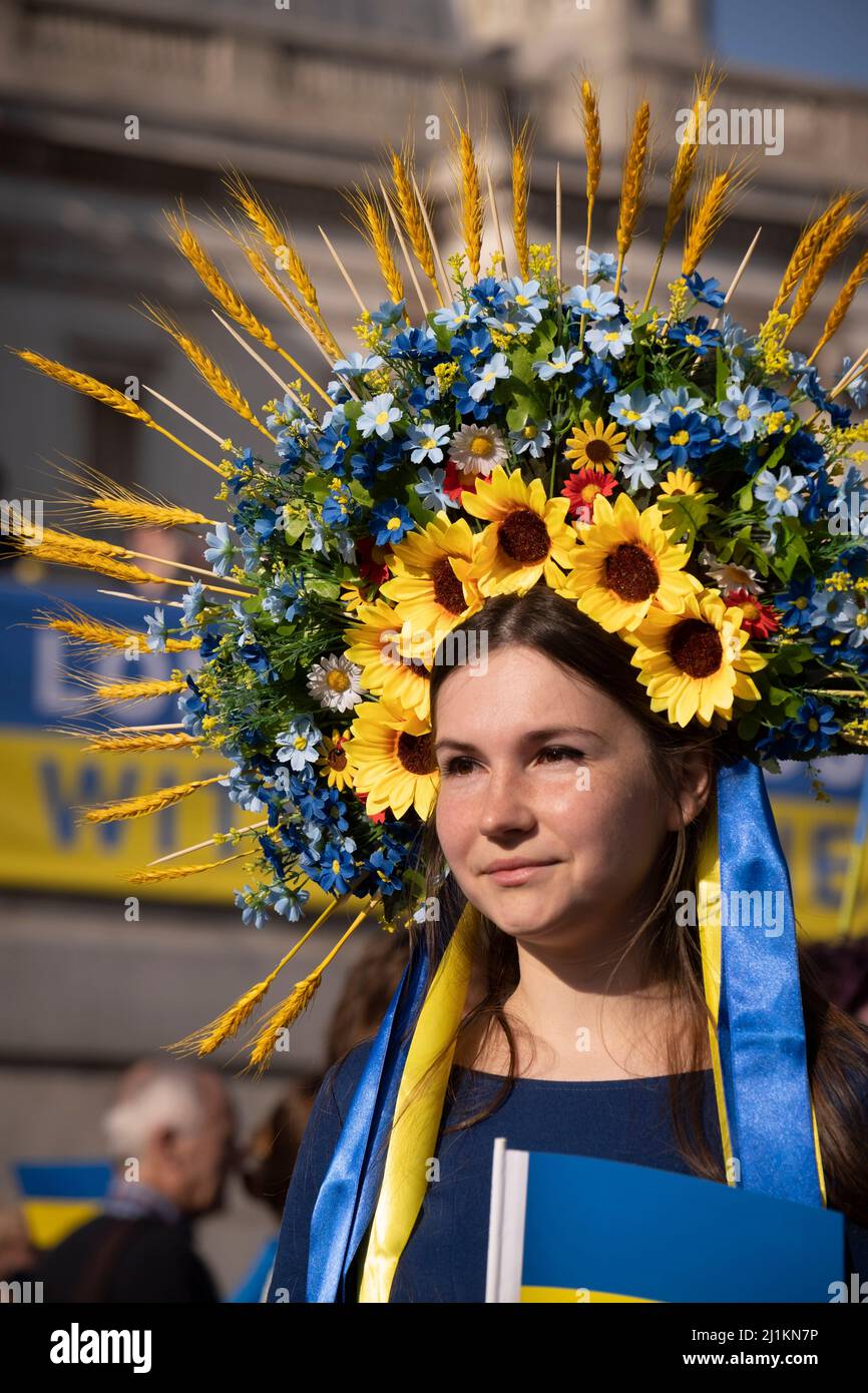 A Ukrainian woman stands in Trafalgar Square during the protest in ...